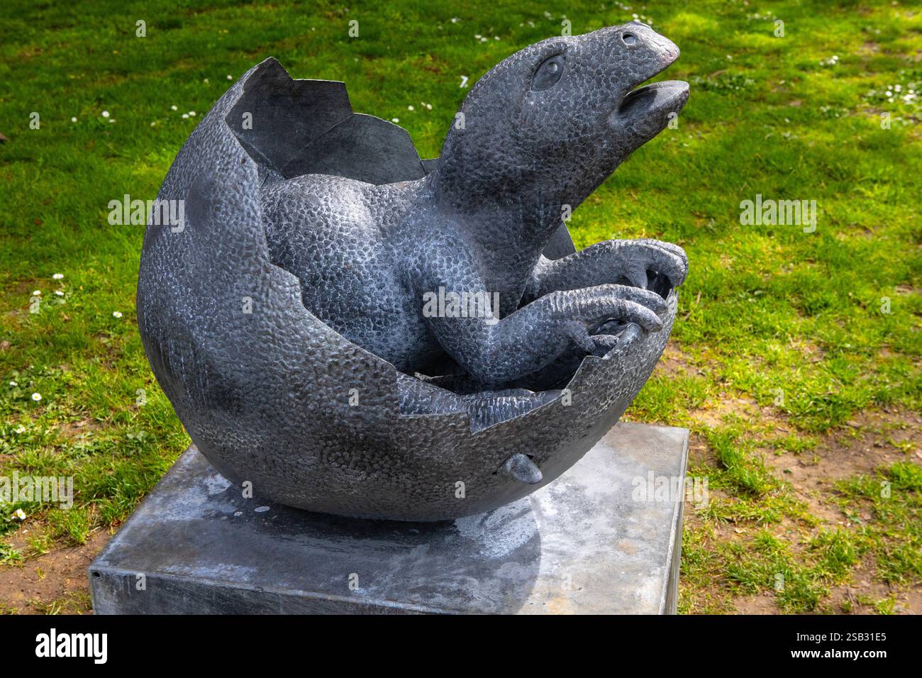 Kent, UK - April 13th 2024: Statue of a hatching baby Iguanodon ...