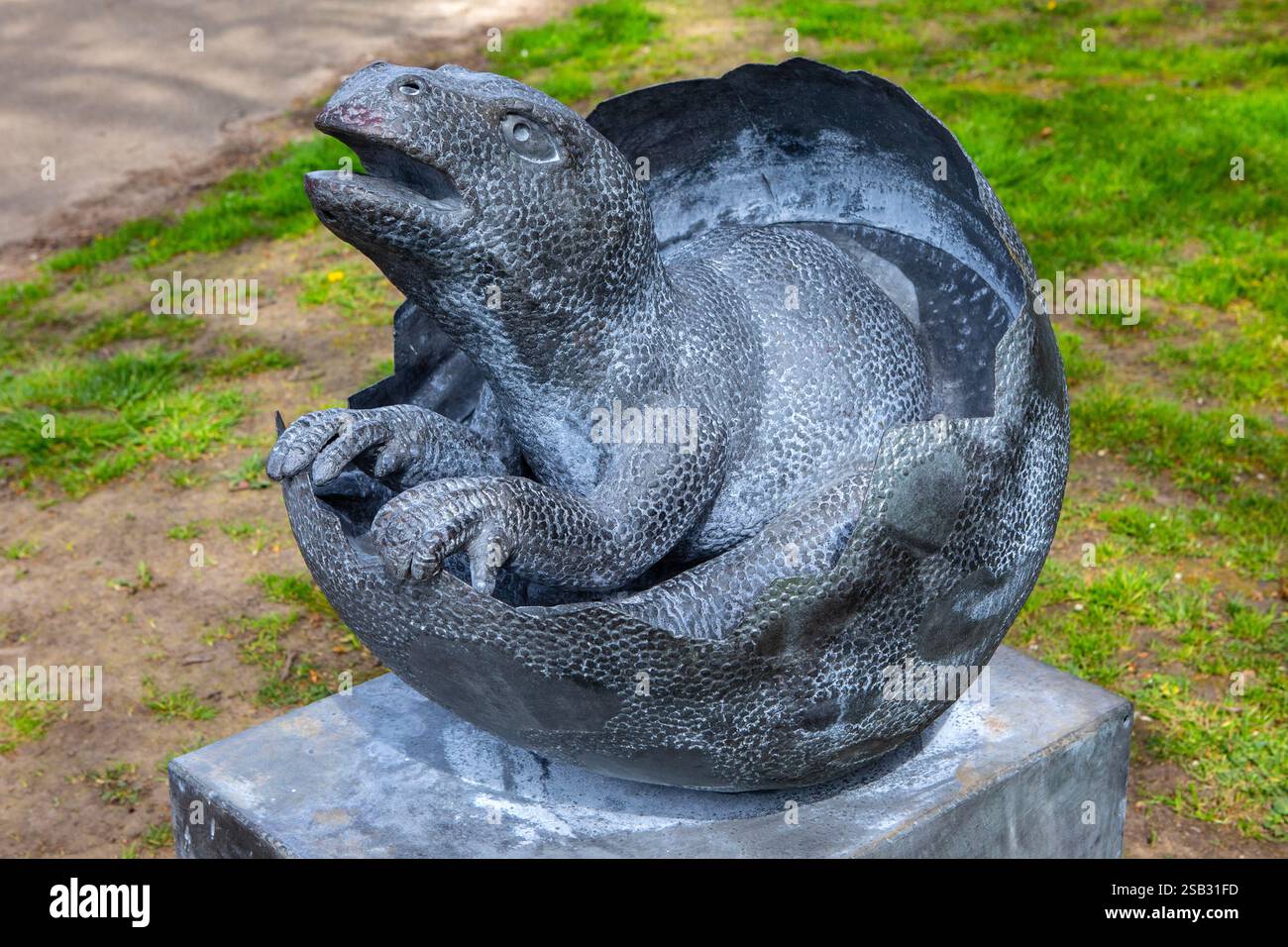 Kent, UK - April 13th 2024: Statue of a hatching baby Iguanodon ...