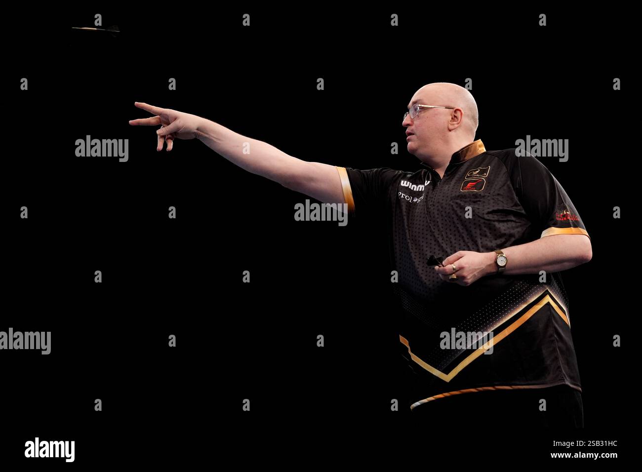 Andrew Gilding during his first round match against Nathan Aspinall on ...