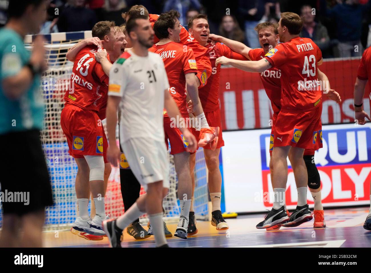 Denmark players celebrate after winning a semifinal match against ...