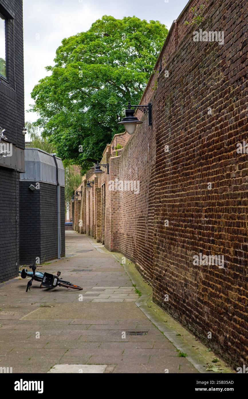 View down Angel Alley in Southwark, London, with the wall of the old ...