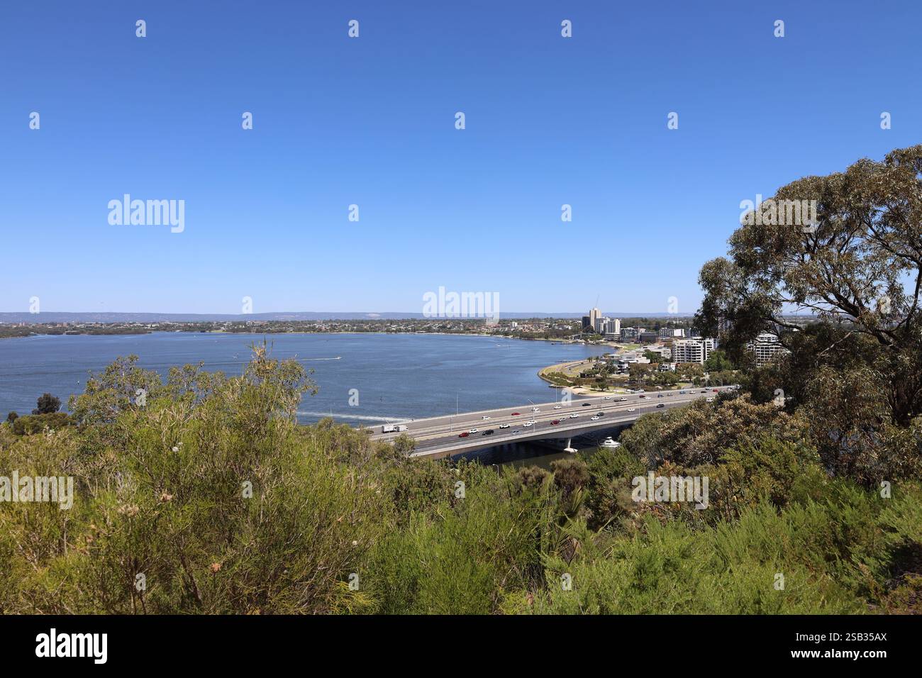wide-angle panoramic landscape highway bridge and large ocean bay under ...