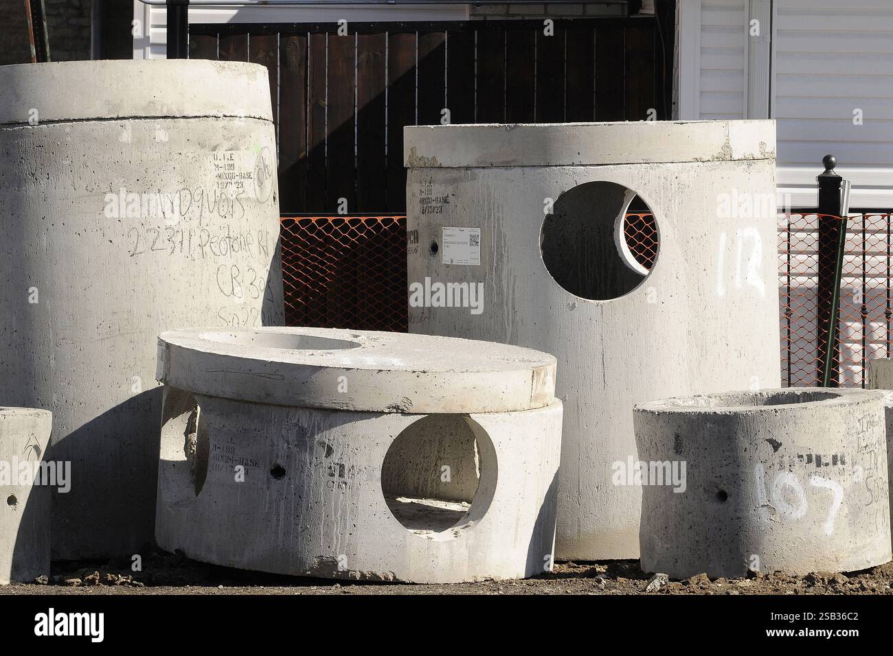 Concrete catch basins ready to be installed as part of a municipal road ...