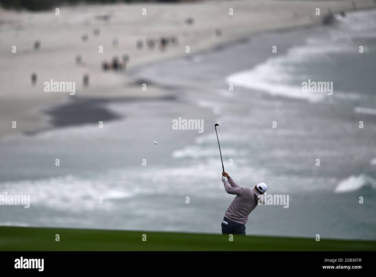 Jordan Spieth hits from the ninth fairway at Pebble Beach Golf Links ...