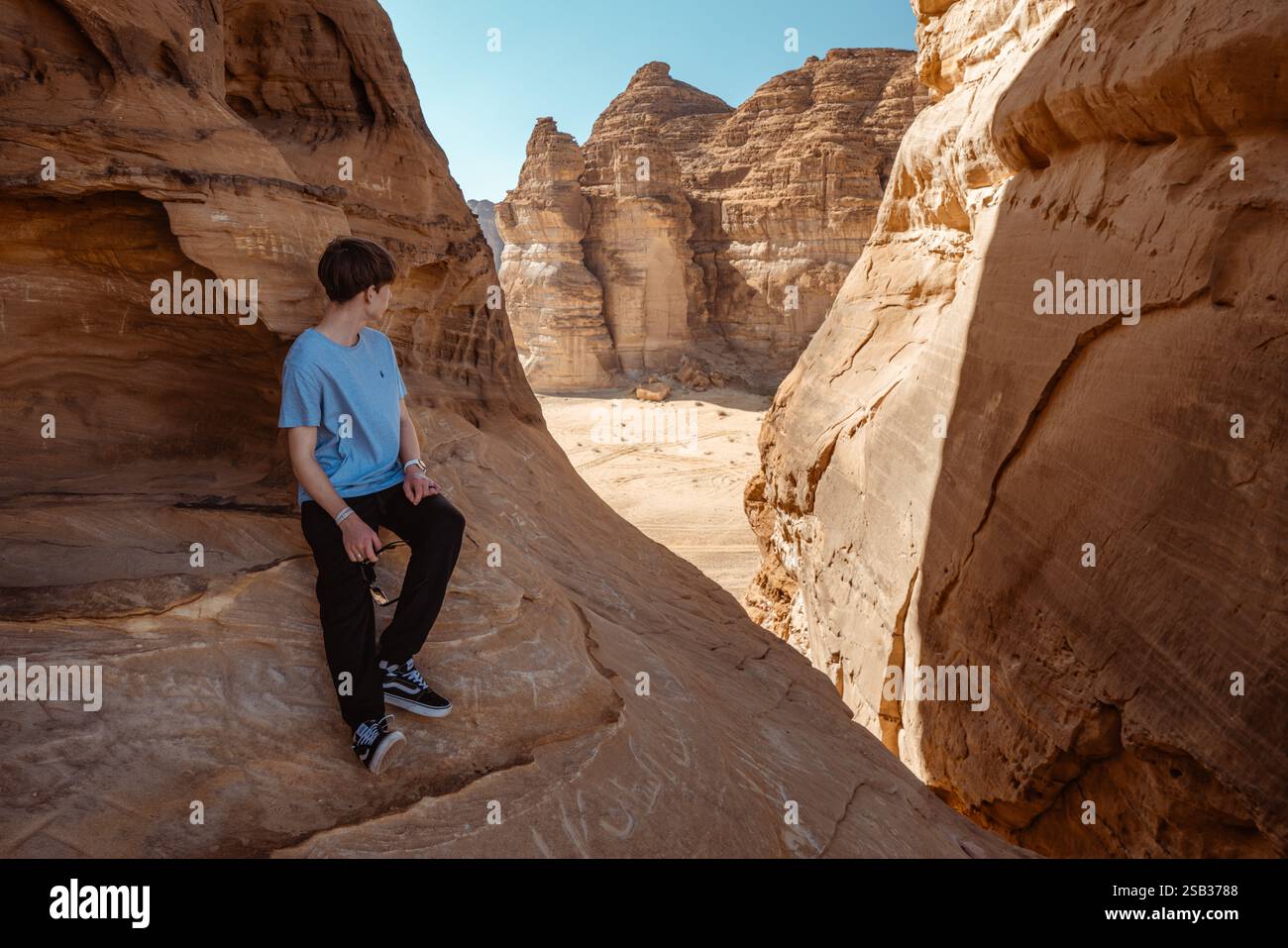 Exploring the Ancient Sandstone Canyons of AlUla, Saudi Arabia. A young ...