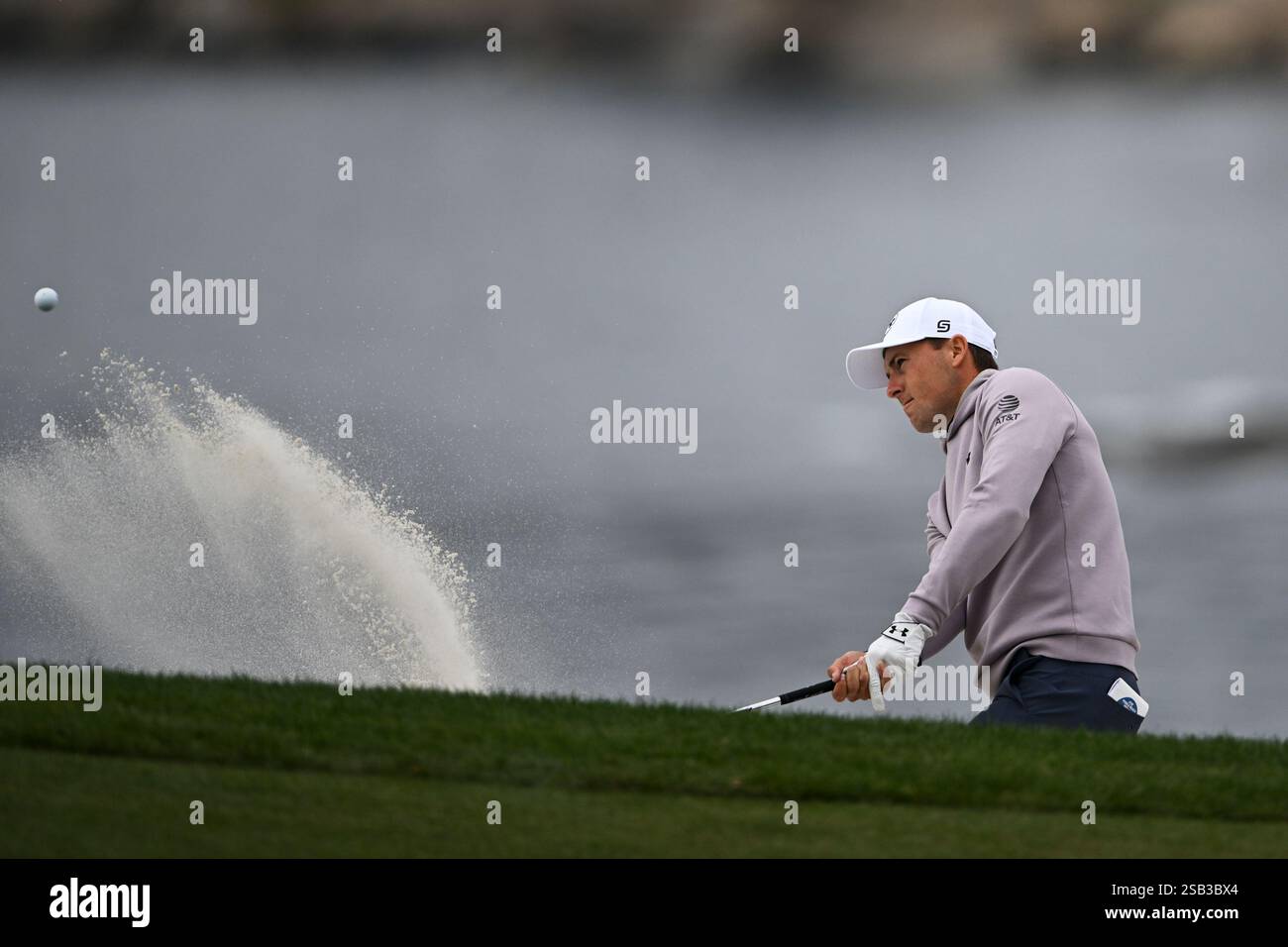 Jordan Spieth hits from a bunker on the sixth hole at Pebble Beach Golf ...
