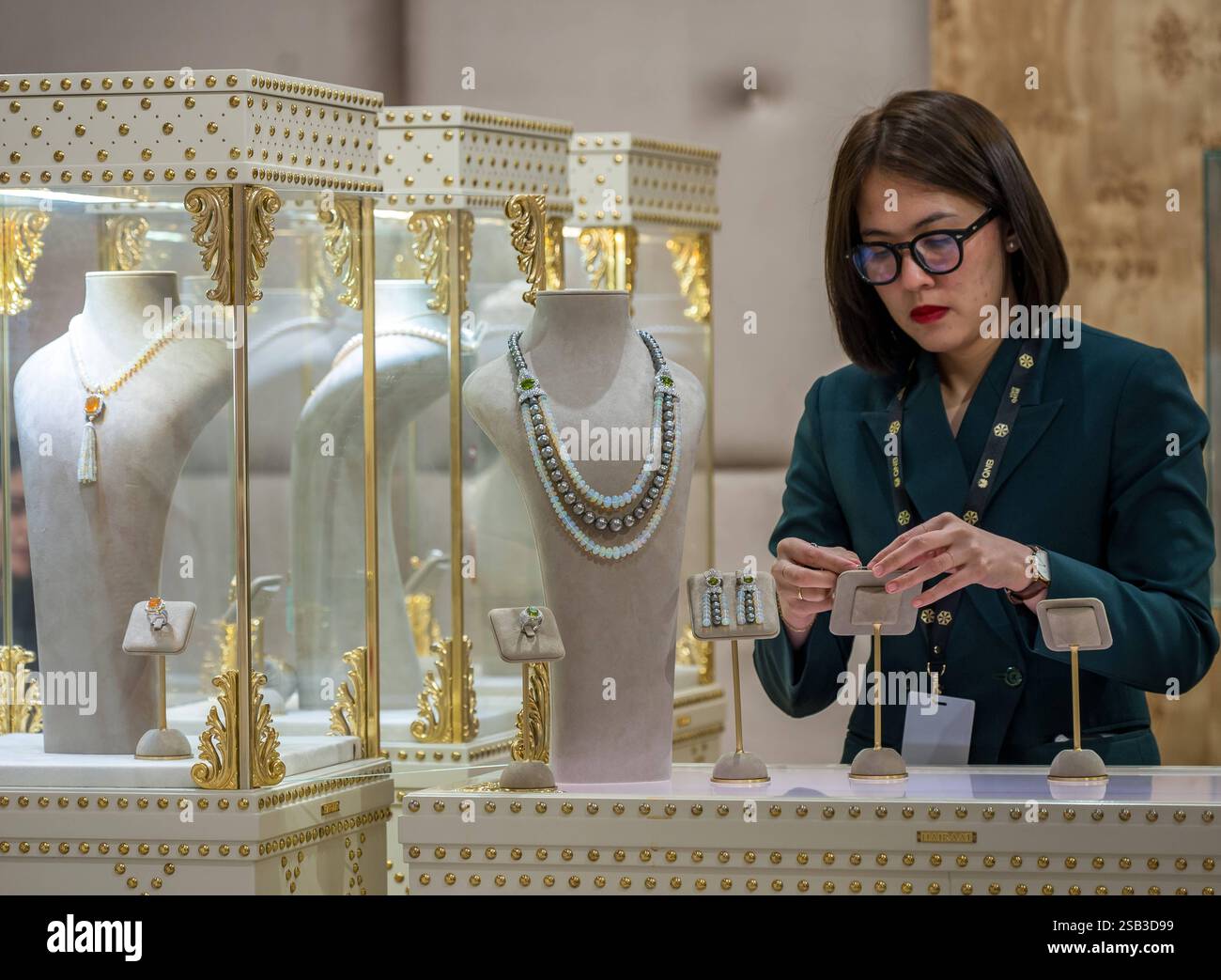 DOHA JEWELLERY AND WATCHES EXHIBITION A woman prepares Jewellery at at ...