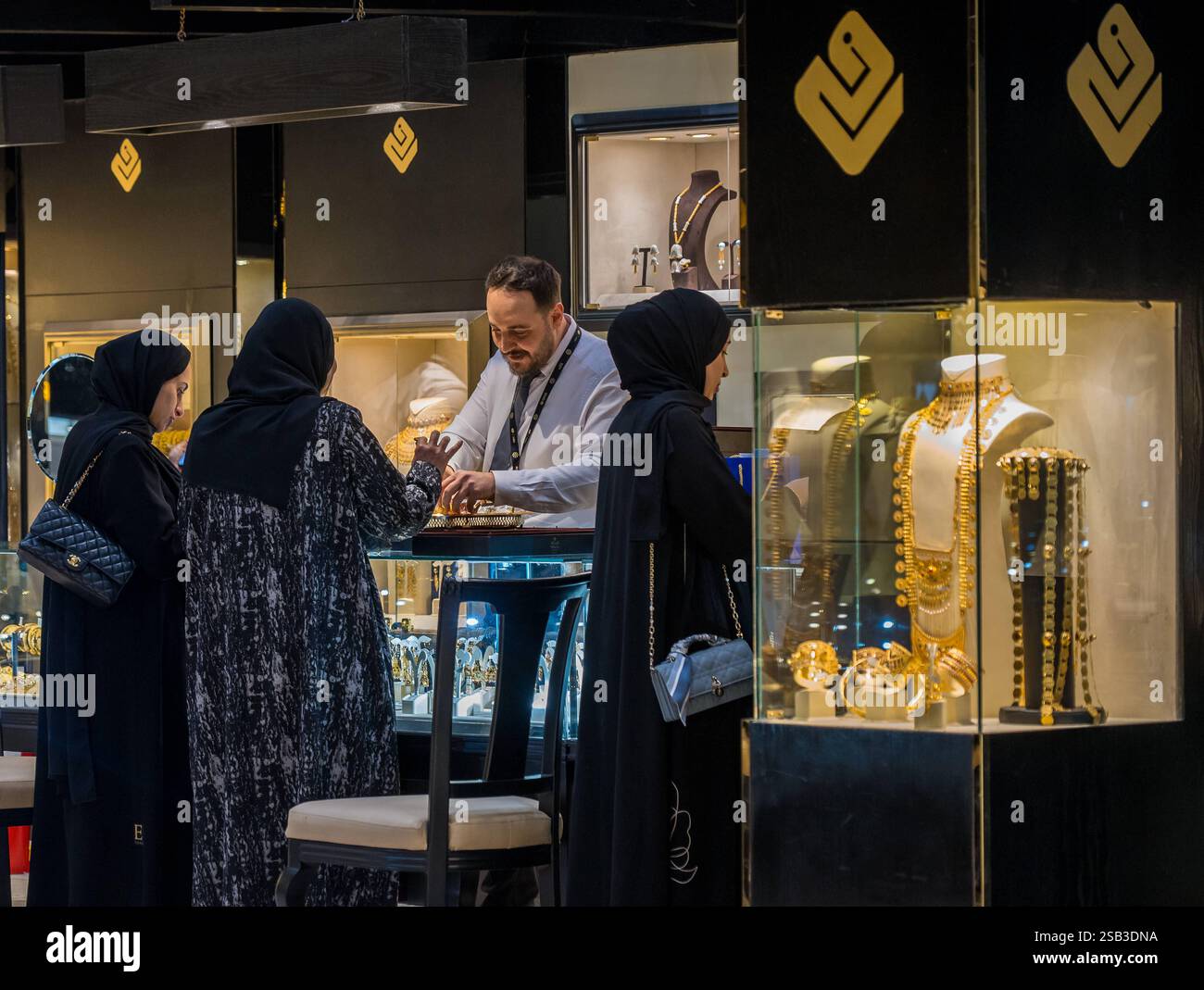 DOHA JEWELLERY AND WATCHES EXHIBITION People visit and look at gold and ...