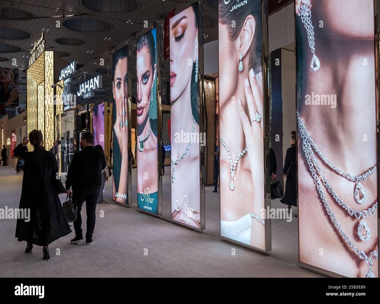 DOHA JEWELLERY AND WATCHES EXHIBITION People visit and look at gold and ...