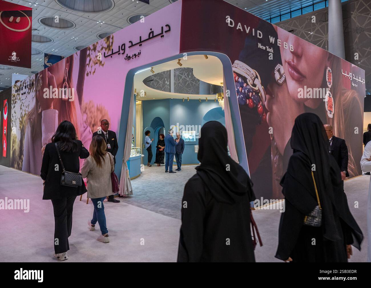 DOHA JEWELLERY AND WATCHES EXHIBITION People visit and look at gold and ...