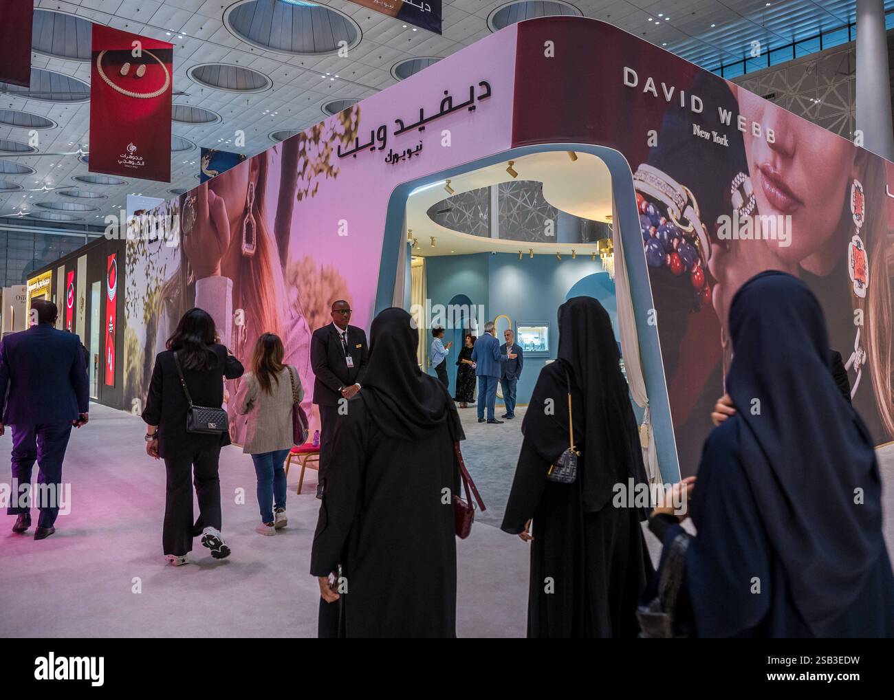 DOHA JEWELLERY AND WATCHES EXHIBITION People visit and look at gold and ...