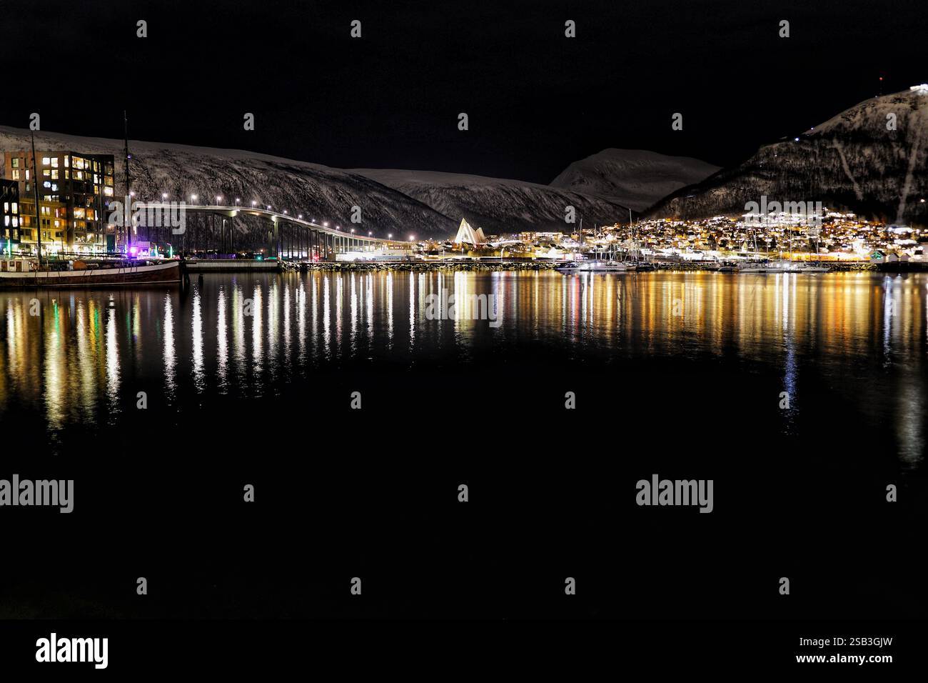 Night view of Tromso, Norway. Illuminated buildings, the Arctic ...