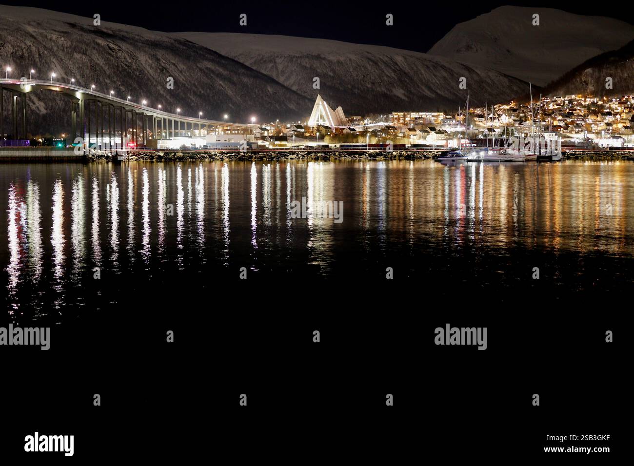 Night view of Tromso, Norway. Illuminated buildings, the Arctic ...