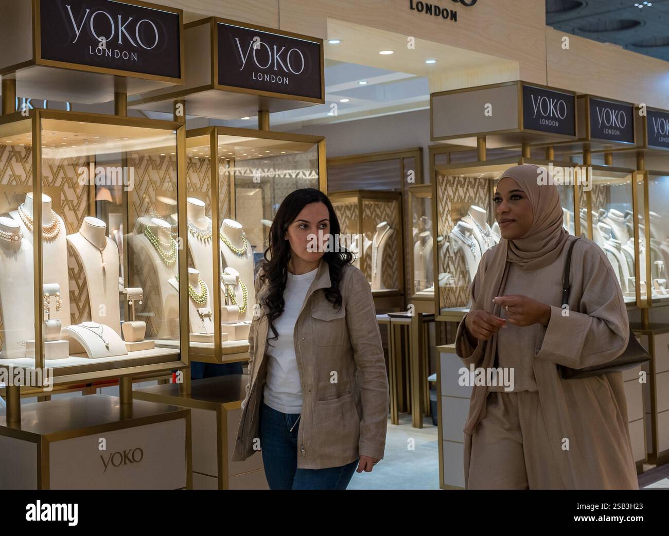 DOHA JEWELLERY AND WATCHES EXHIBITION People visit and look at gold and ...