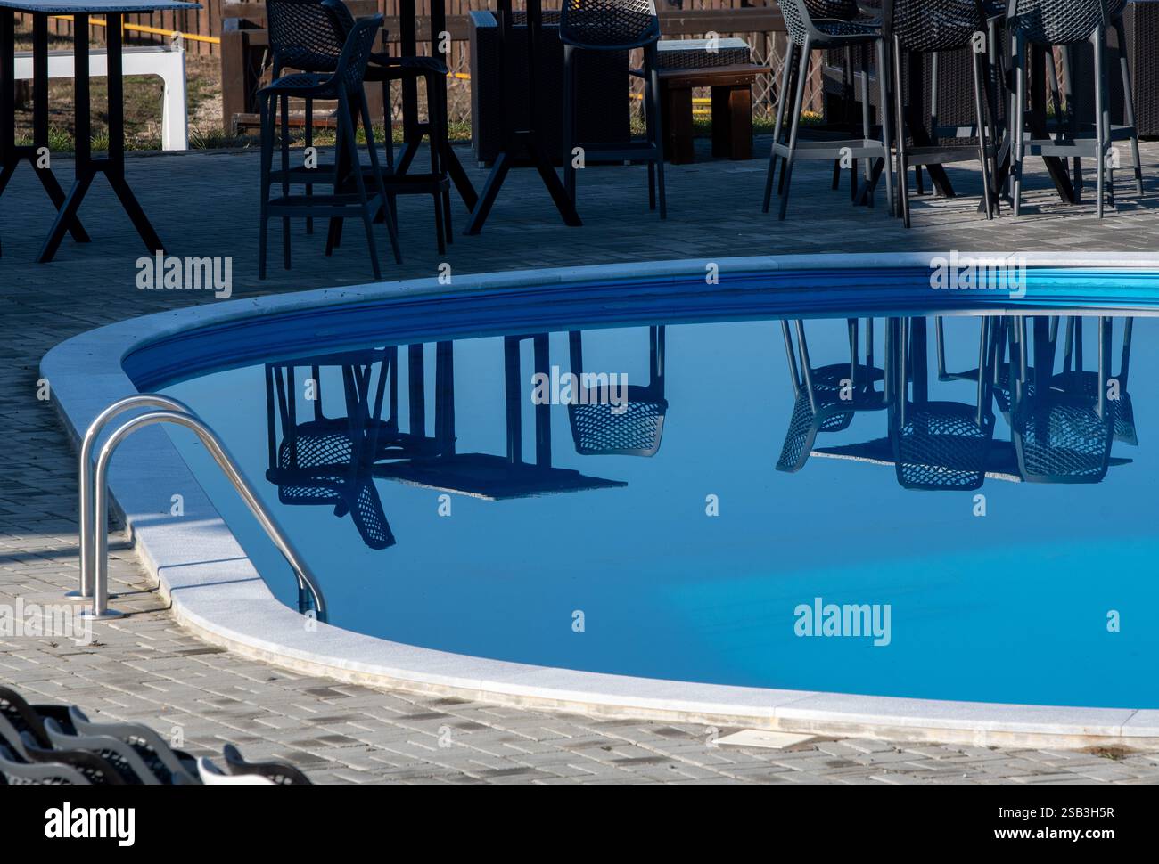 Summer Nostalgia – Reflections of Empty Seats and Tables Stock Photo ...