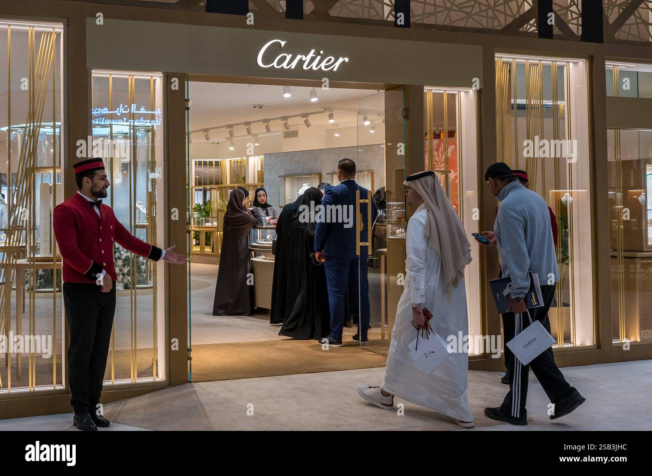 DOHA JEWELLERY AND WATCHES EXHIBITION People visit and look at gold and ...