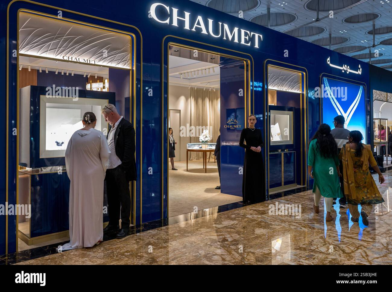 DOHA JEWELLERY AND WATCHES EXHIBITION People visit and look at gold and ...