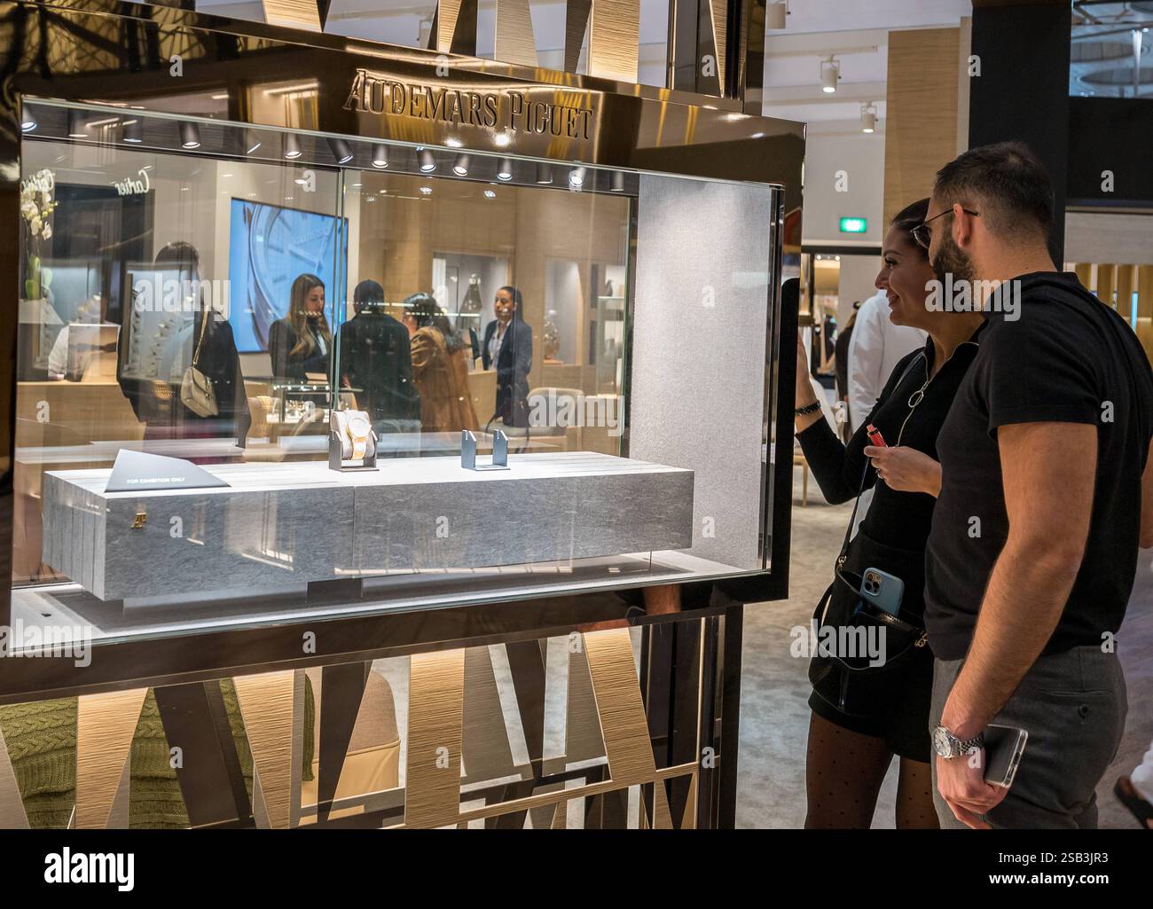 DOHA JEWELLERY AND WATCHES EXHIBITION People visit and look at gold and ...