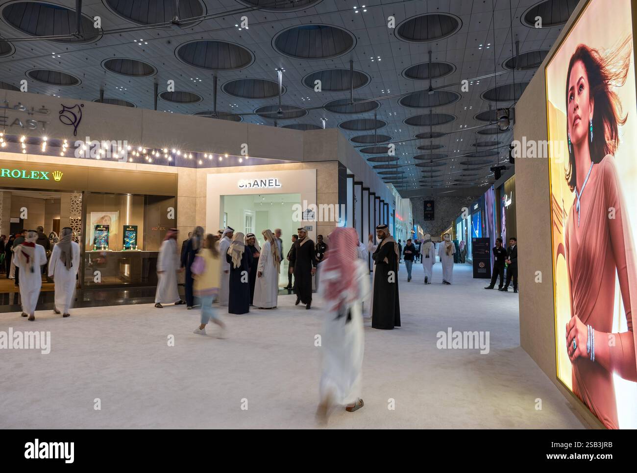 DOHA JEWELLERY AND WATCHES EXHIBITION People visit and look at gold and ...