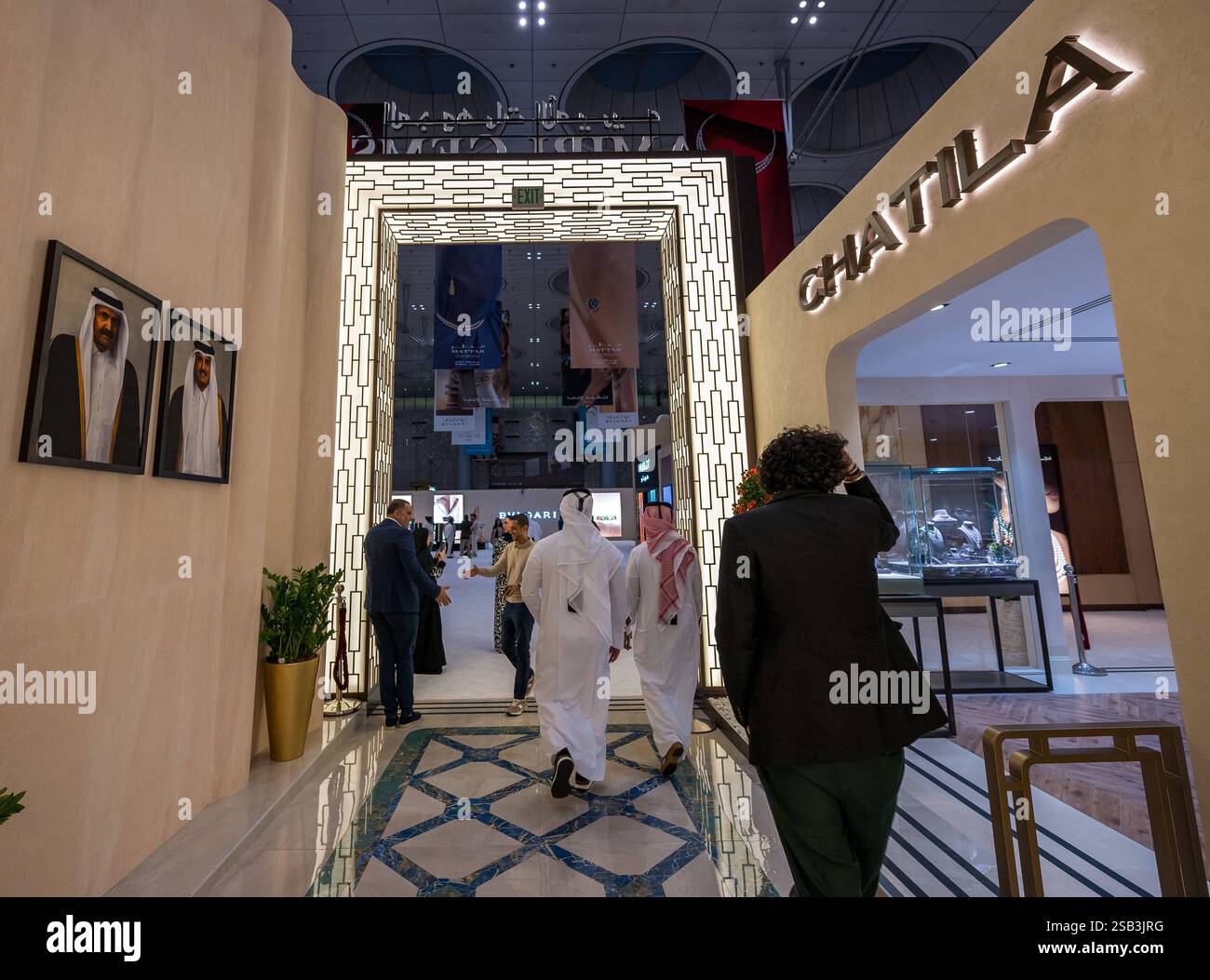 DOHA JEWELLERY AND WATCHES EXHIBITION People visit and look at gold and ...
