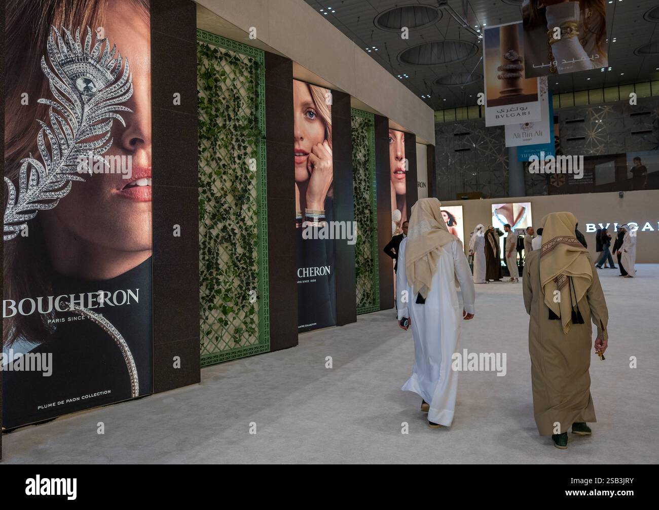 DOHA JEWELLERY AND WATCHES EXHIBITION People visit and look at gold and ...