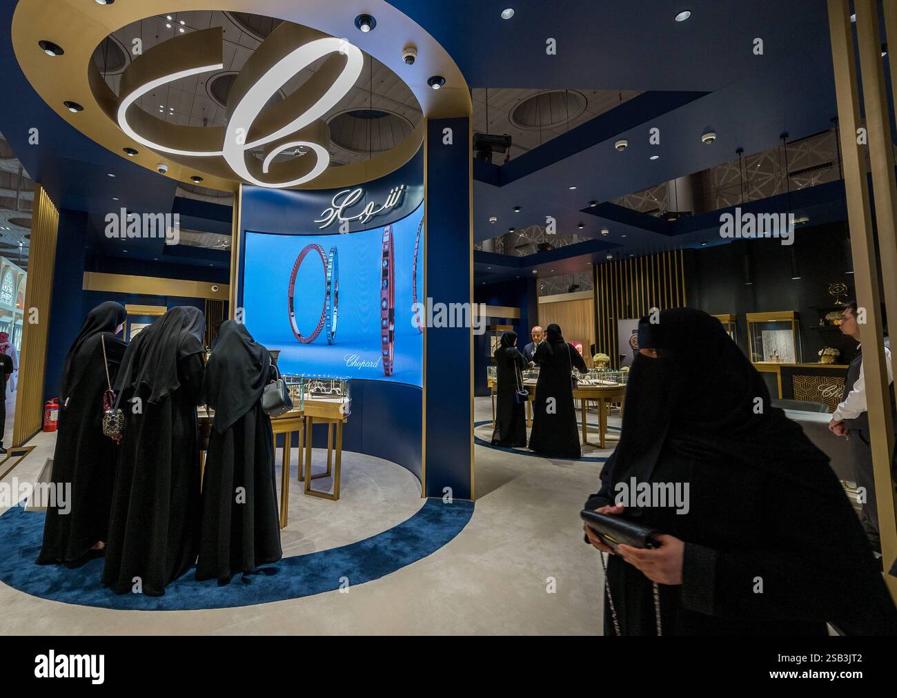 DOHA JEWELLERY AND WATCHES EXHIBITION People visit and look at gold and ...