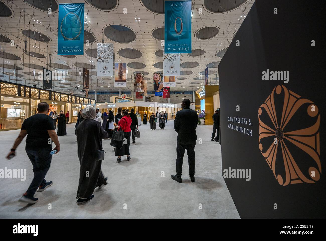 DOHA JEWELLERY AND WATCHES EXHIBITION People visit and look at gold and ...