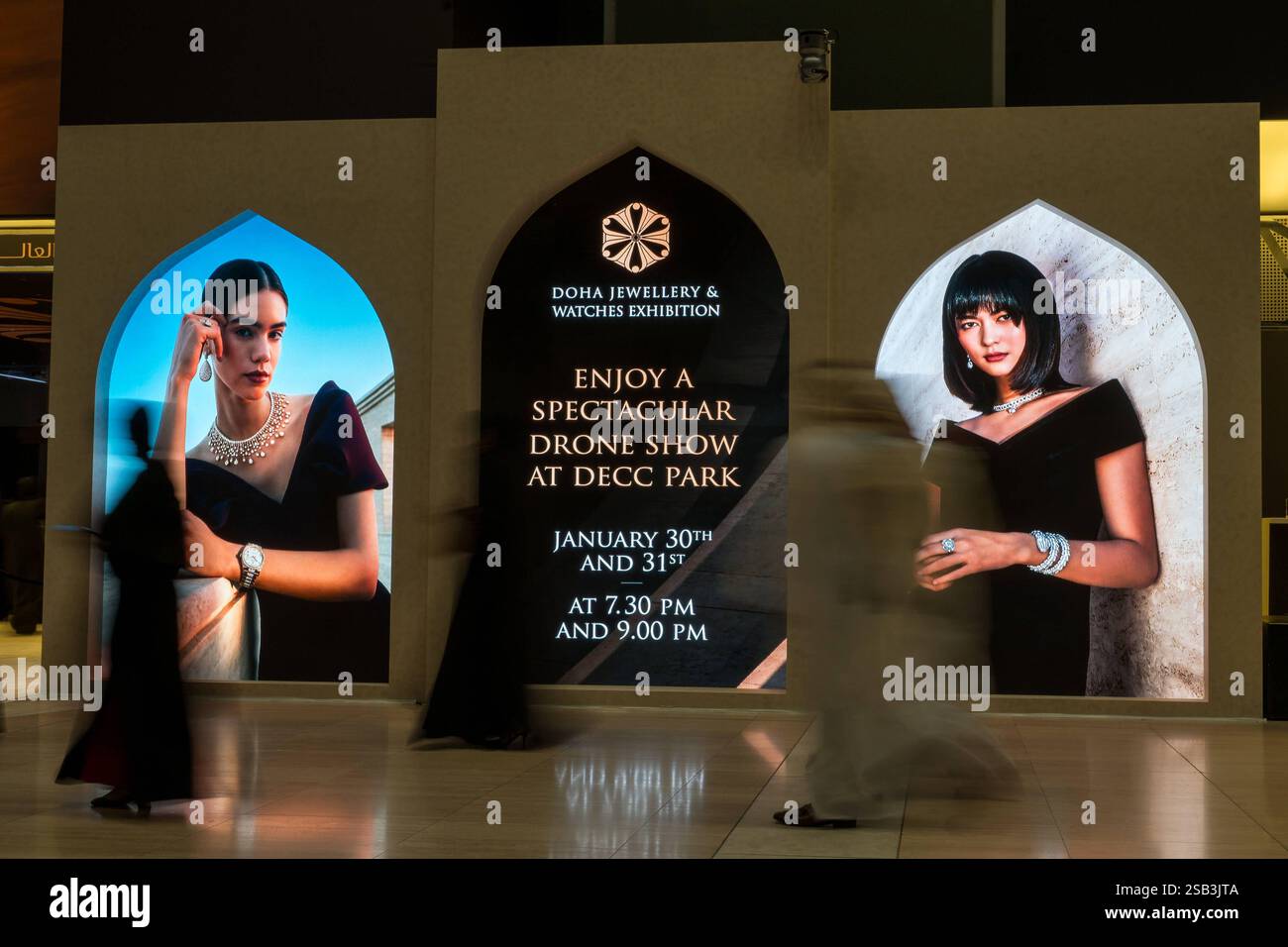DOHA JEWELLERY AND WATCHES EXHIBITION People visit and look at gold and ...