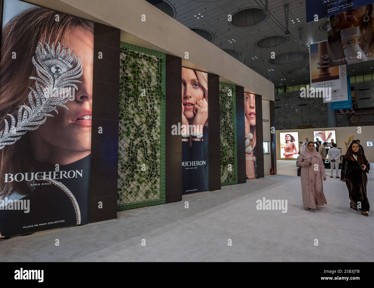 DOHA JEWELLERY AND WATCHES EXHIBITION People visit and look at gold and ...