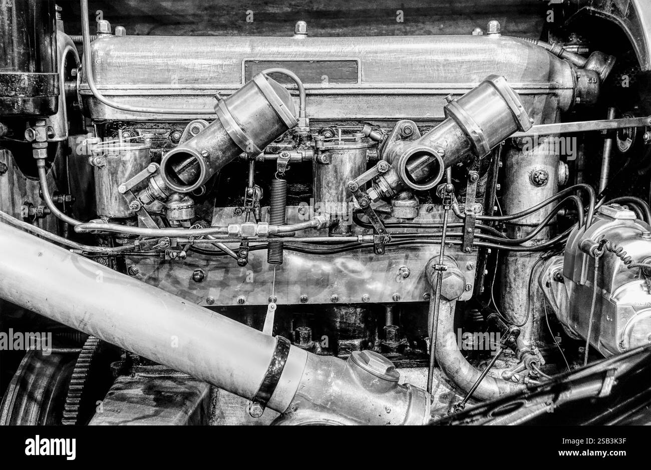 Close-up of an old engine from a historic English luxury vintage car in ...