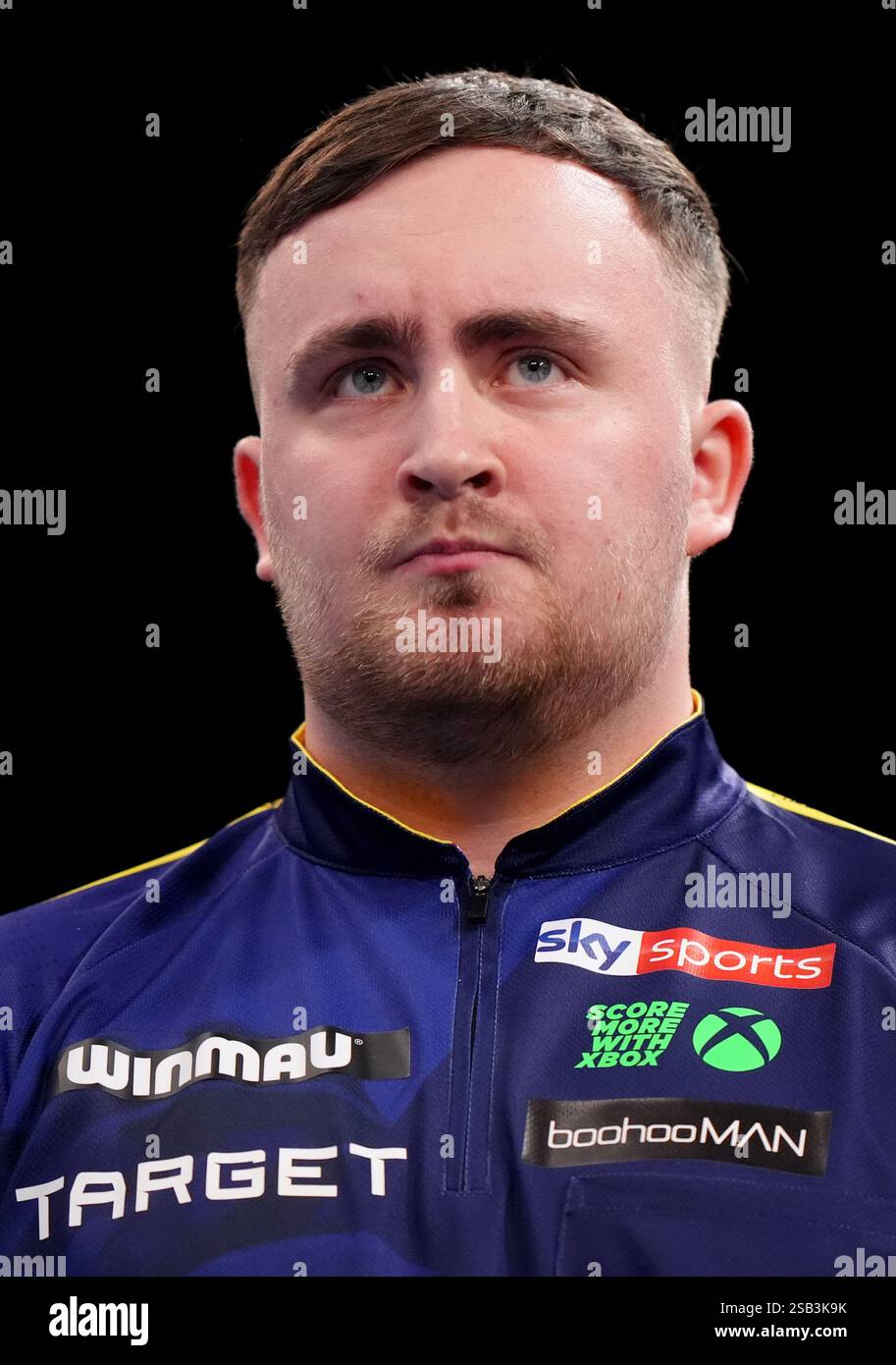 Luke Littler during his first round match against Andy Baetens during ...