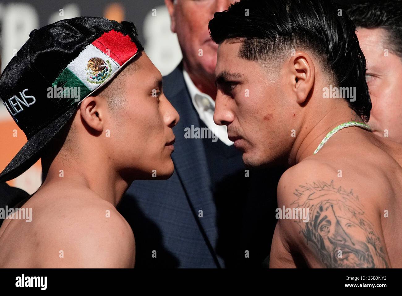 Isaac Cruz, left, and Angel Fierro face off during a ceremonial weigh ...