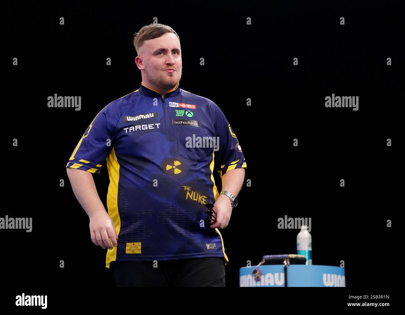 Luke Littler during his first round match against Andy Baetens on day ...