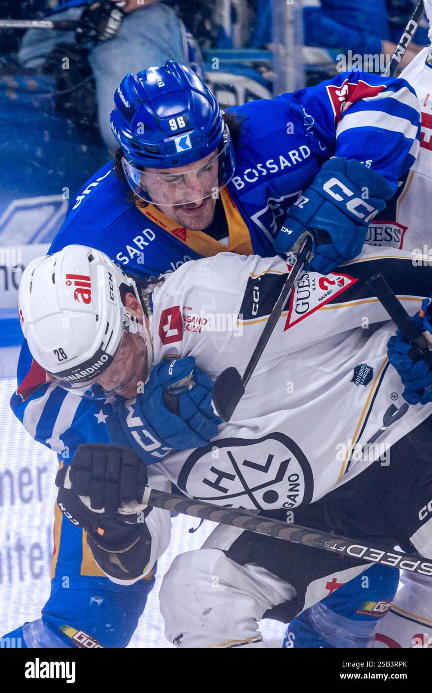 Daniel Vozenilek #96 (EV Zug) defends his teammate Jan Kovar #43 (EV ...