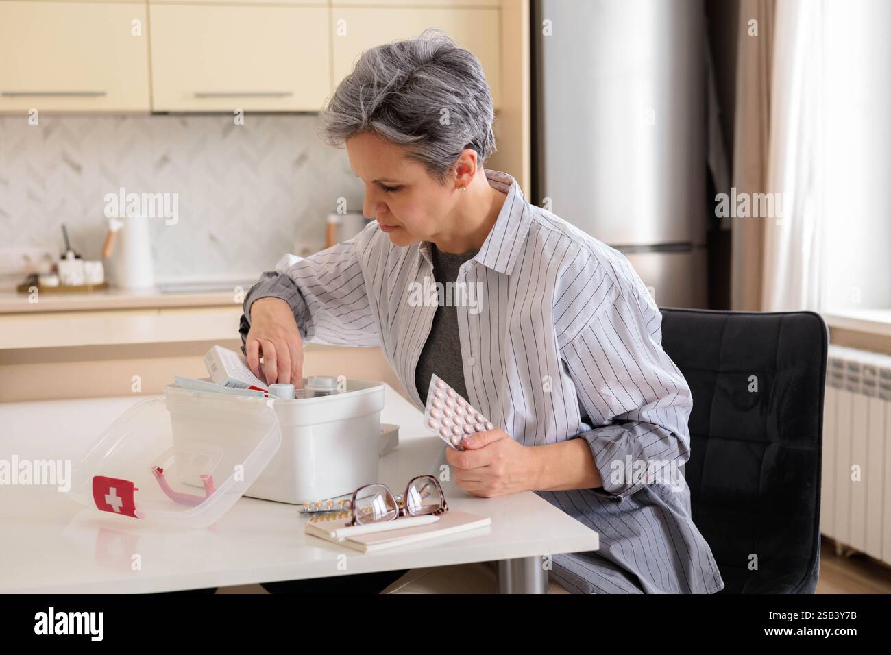 Beautiful, well-groomed and aged woman pensioner aged with gray ...