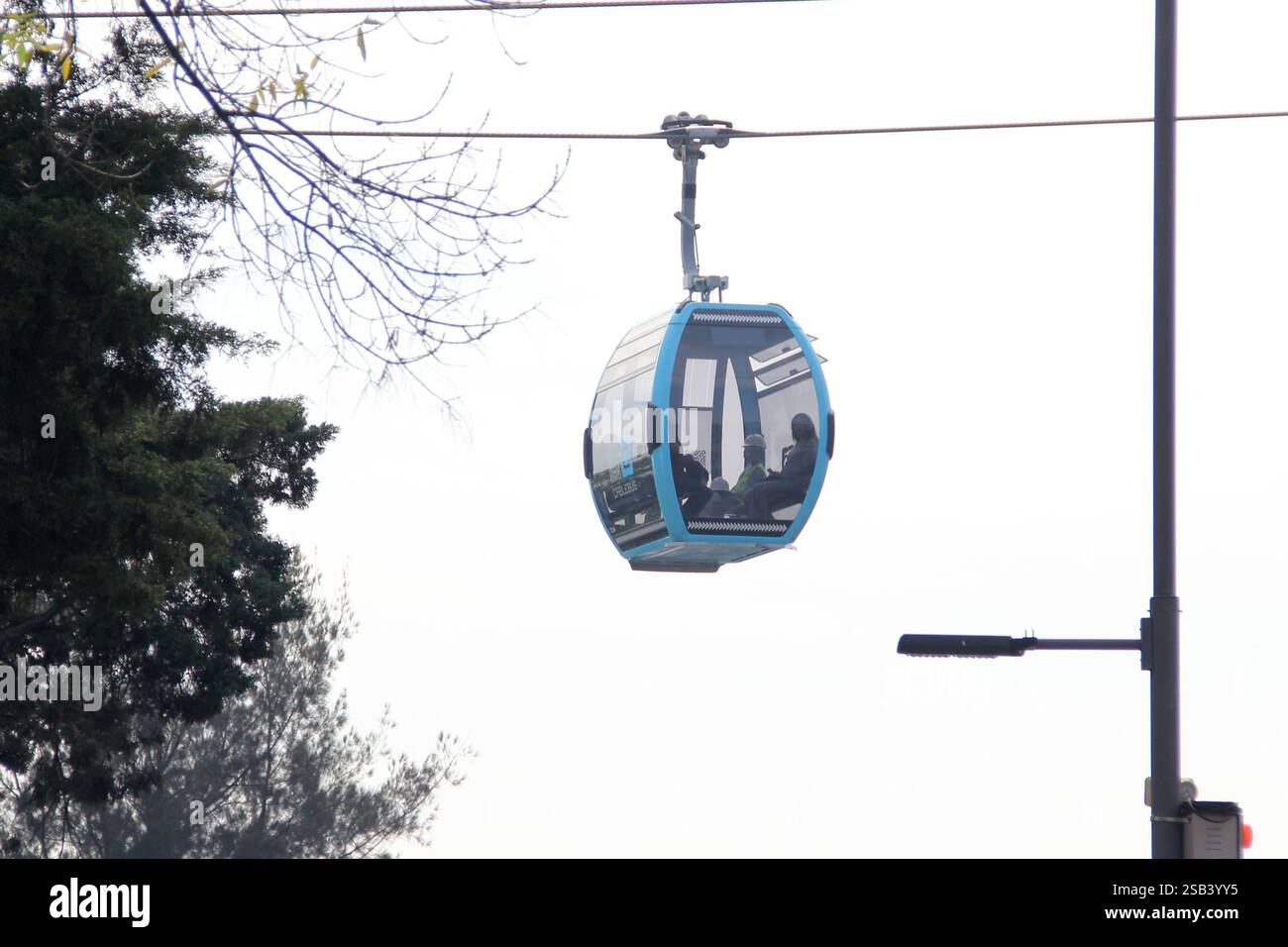 Mexico City, Mexico - Jan 8 2025: Cabins with passengers of Cablebus ...
