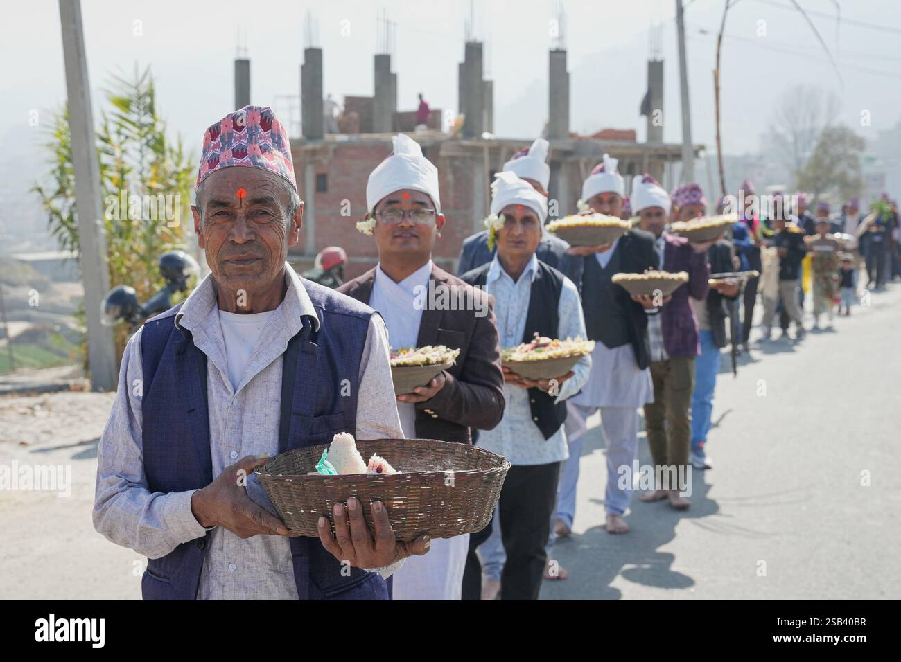 Members of the Newar community attend a religious ritual during the ...
