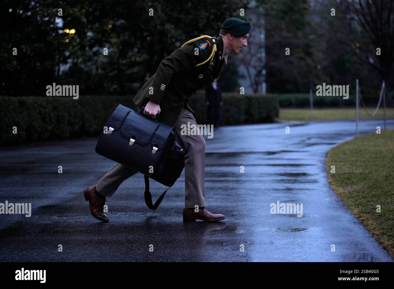A military aide carries a briefcase containing codes for the nuclear ...