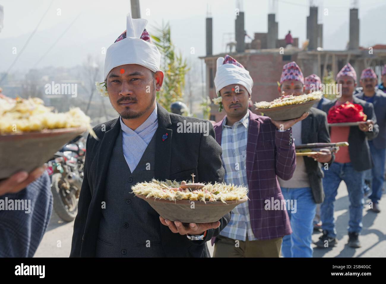 Bhaktapur, Nepal. 31st Jan, 2025. Members of the Newar community attend ...