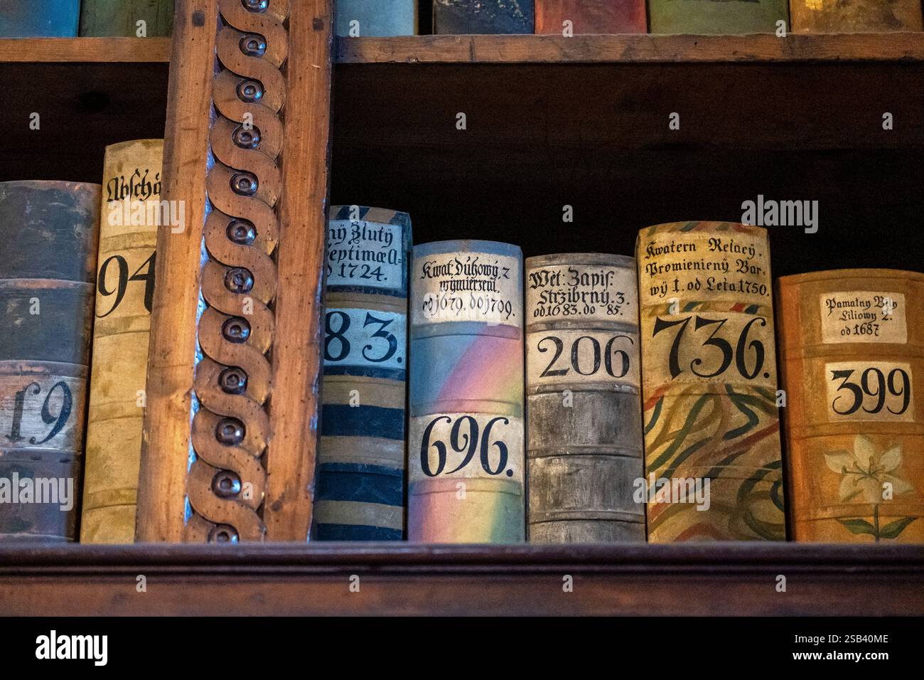 Colorfully painted 18th-century books in the library at Prague Castle ...