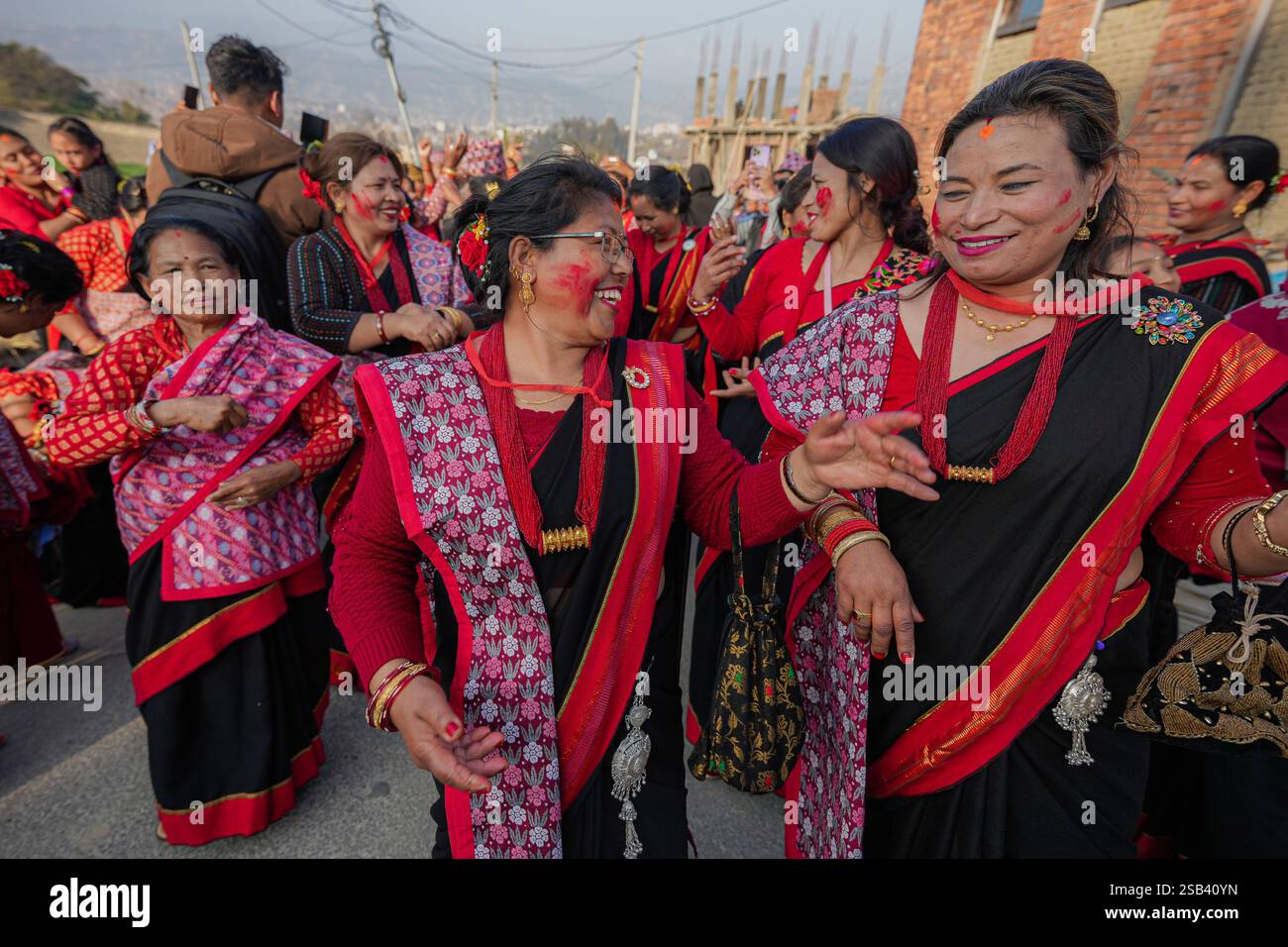Members of the Newar community perform a dance accompanied by ...