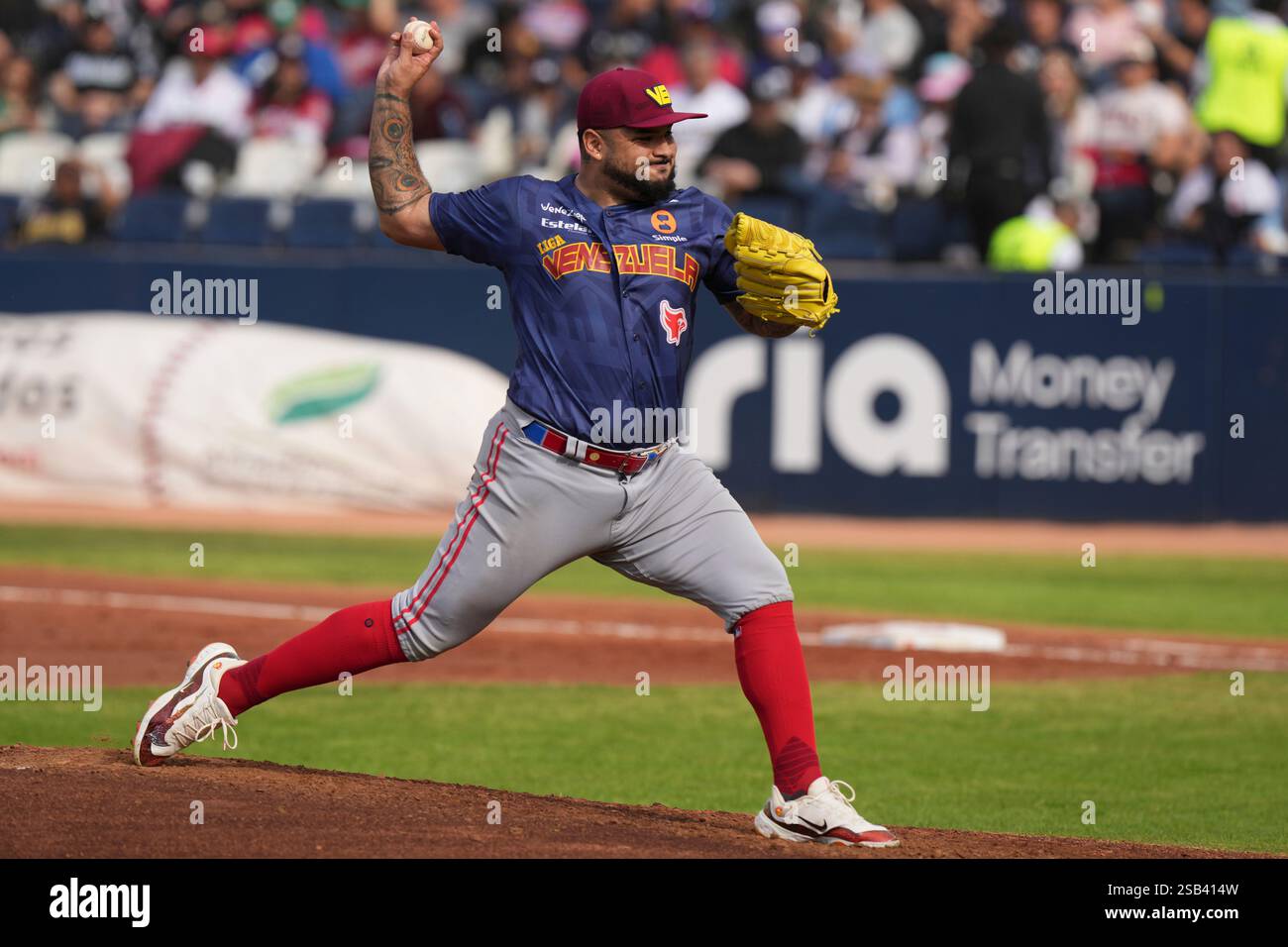 Venezuela's pitcher Max Castillo throws against the Dominican Republic ...