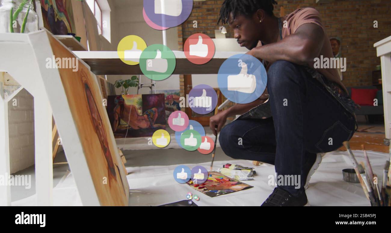 Painting on canvas, artist surrounded by floating thumbs-up image Stock ...