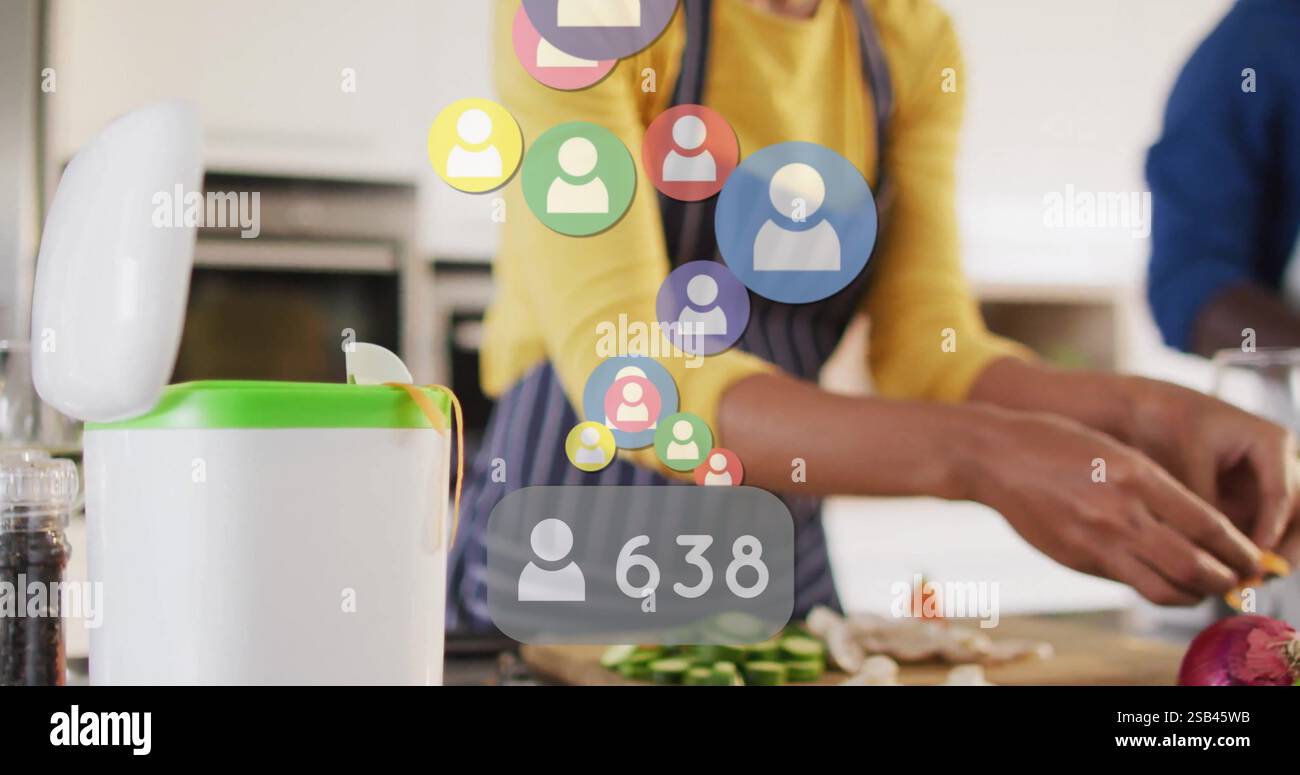 Social media follower count image over people preparing food in kitchen ...