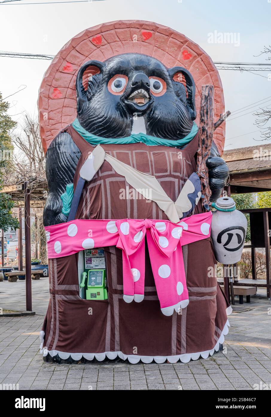 A giant tanuki (raccoon dog) statue outside Shigaraki Station in Koka ...