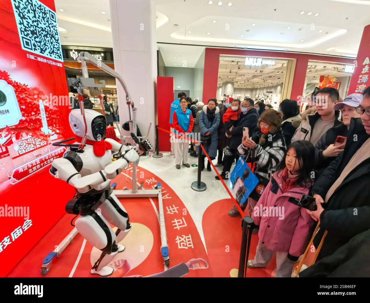 BEIJING, CHINA - JANUARY 31, 2025 - Citizens enjoy a humanoid robot ...
