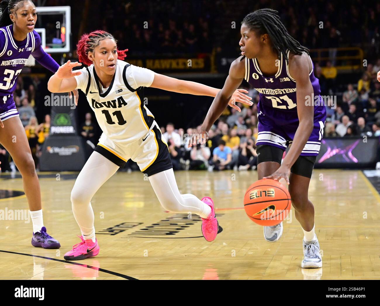 IOWA CITY, IA - JANUARY 28 - Iowa guard Aaliyah Guyton (11) tightly ...