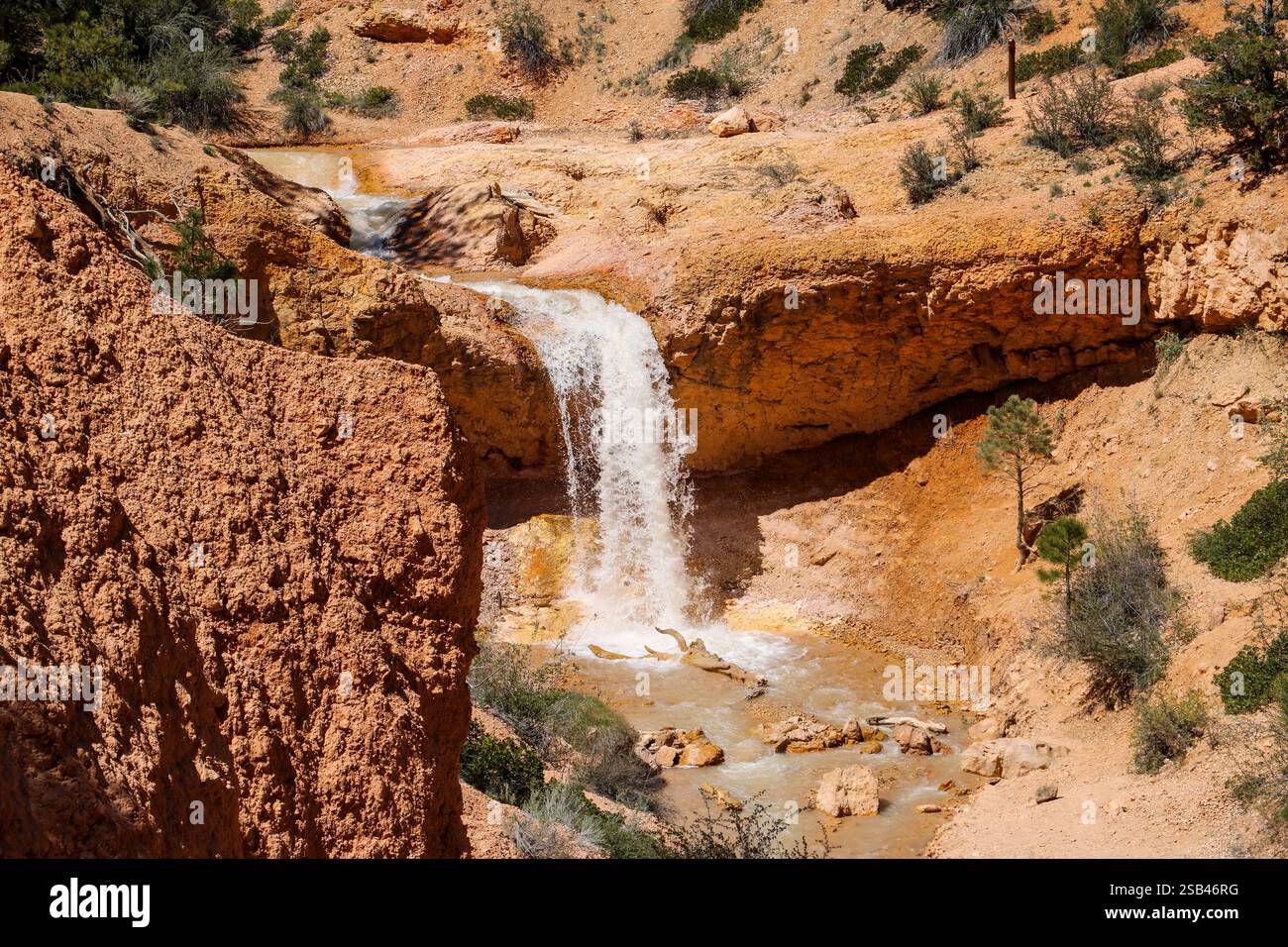 View of Tropic Ditch Waterfall from Mossy Cave Trail at Bryce Canyon ...