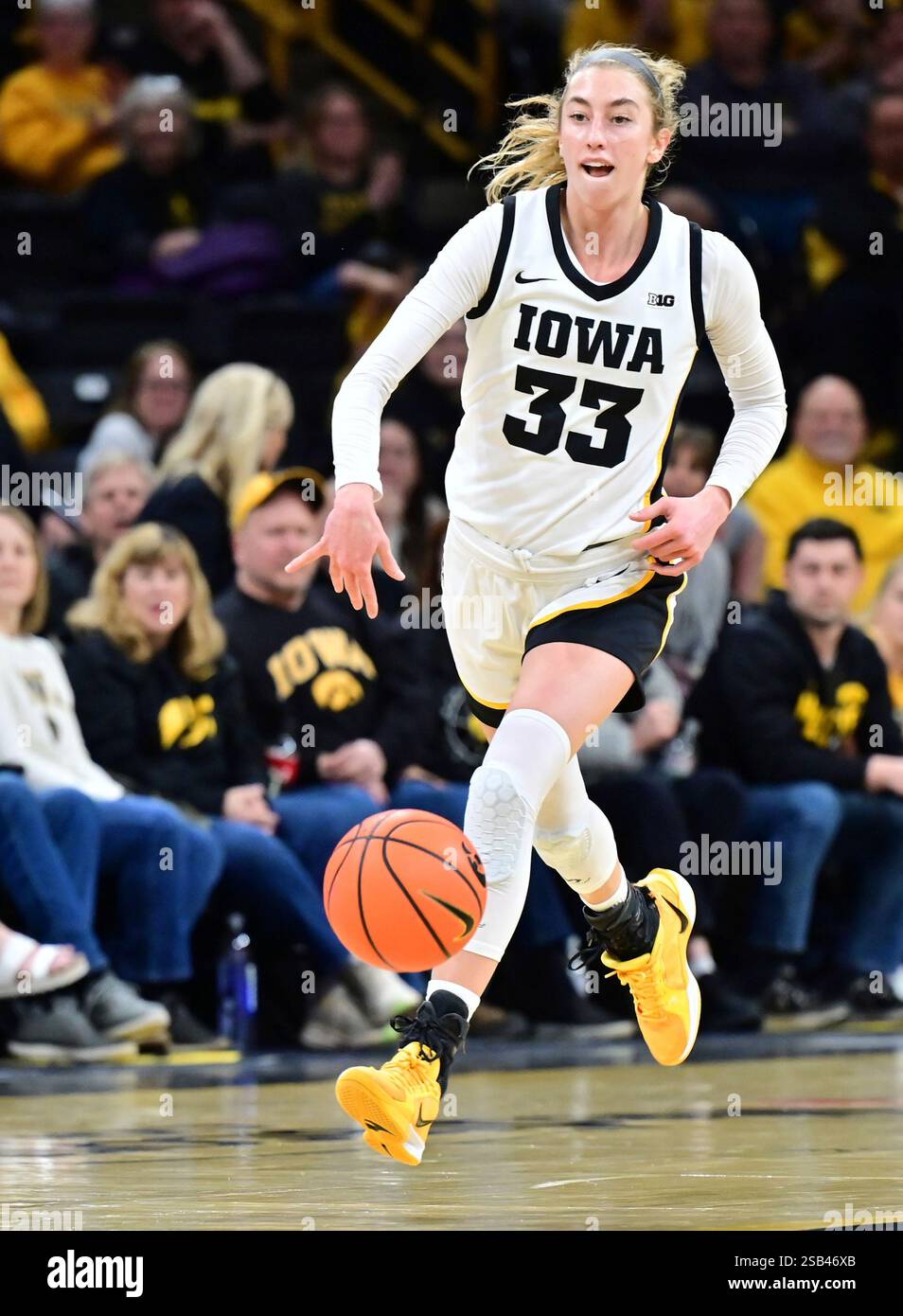 IOWA CITY, IA - JANUARY 28 - Iowa guard Lucy Olsen (33) drives to the ...