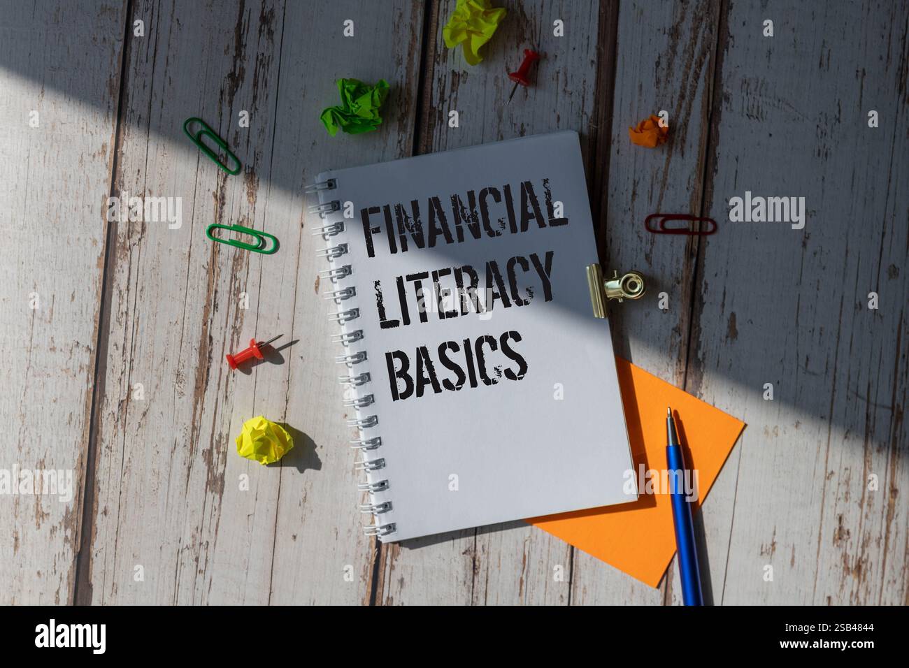 Business quotes, Financial Literacy Basics on notebooks or paper in ...